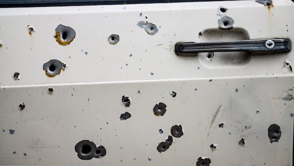 NRS § 202.285 - Firing Guns into Structures or Vehicles